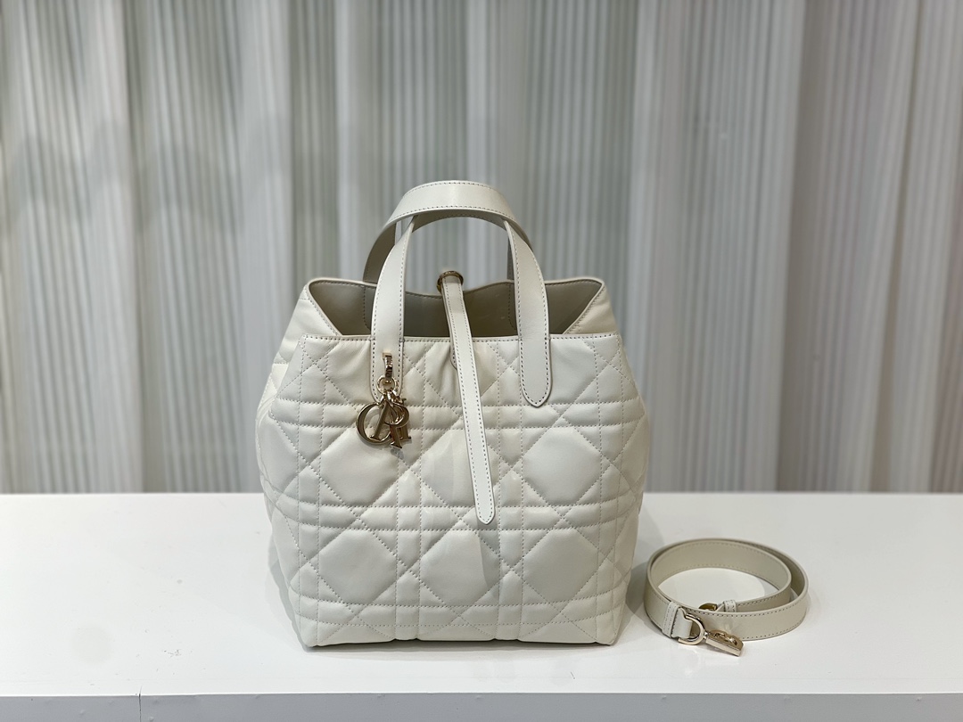 Beige Quilted Leather Bucket Bag with Gold Keychain No Logo and ...