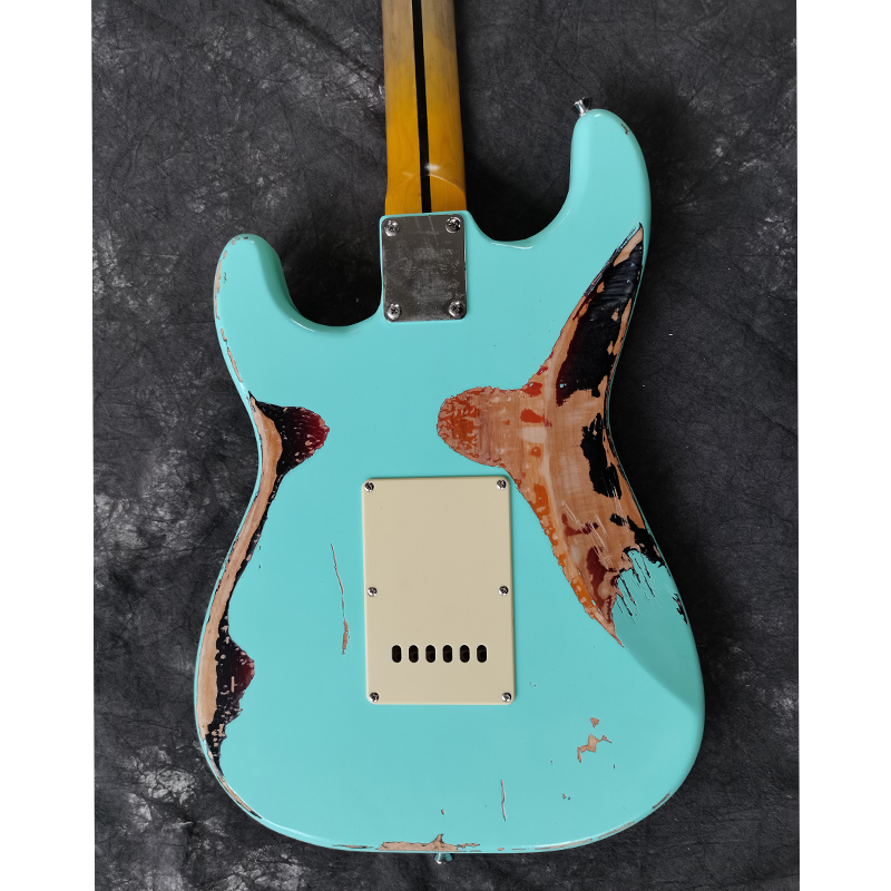 Electric guitar aged turquoise color bottom sunburst yellowish dots ...