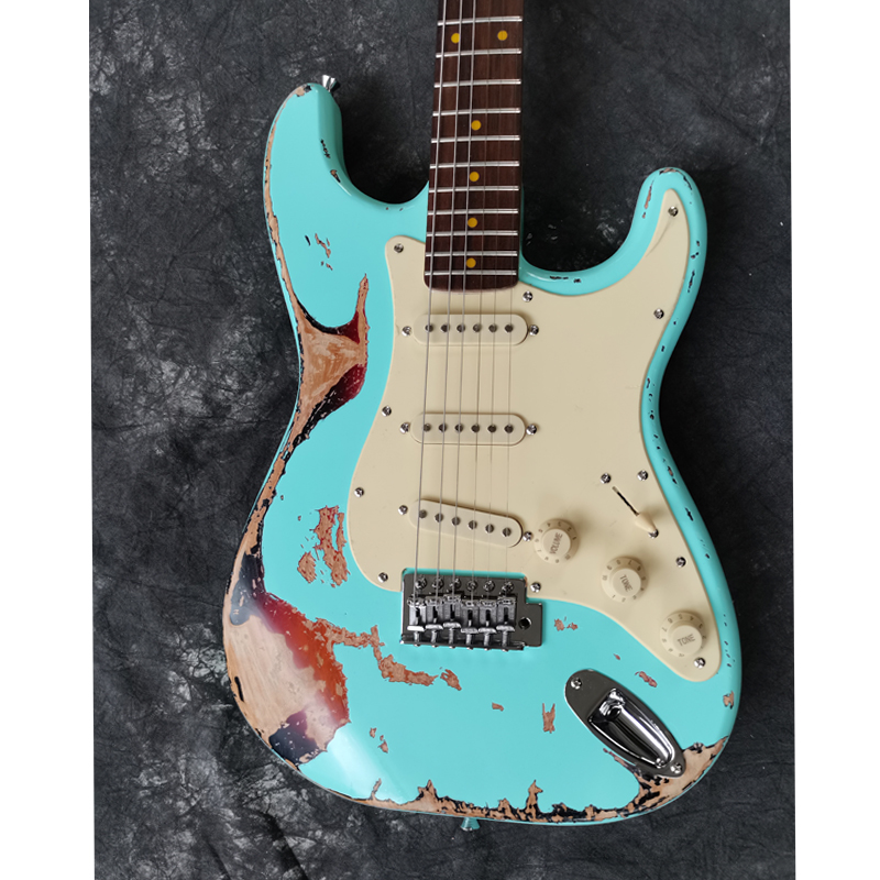 Electric guitar aged turquoise color bottom sunburst yellowish dots ...