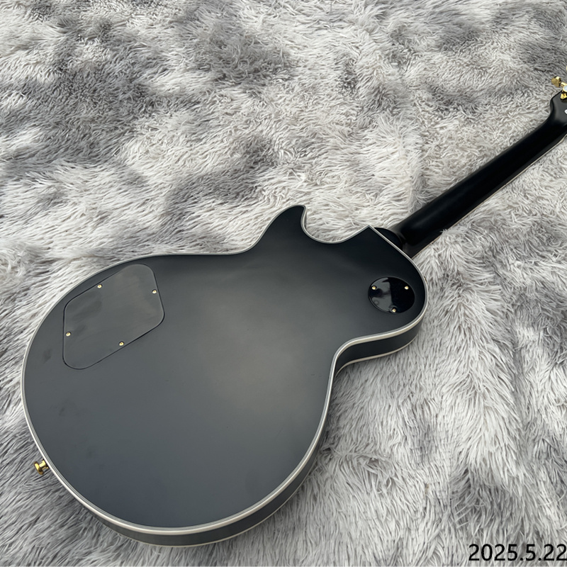 Electric guitar lp solid black p90 pickups aged check lines